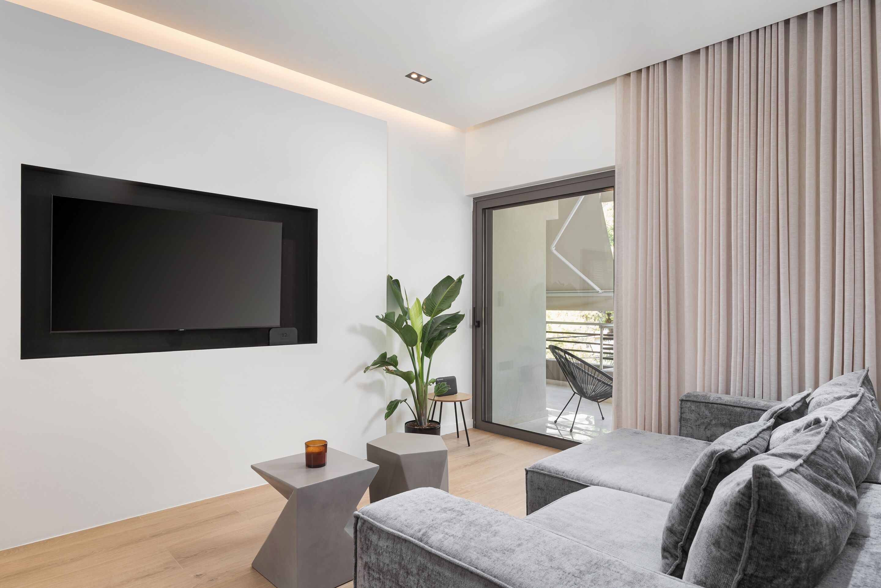 Apartamento Deluxe | Sala | Smart TV de 65 polegadas com canais digitais 