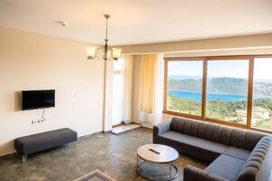 Estúdio família, sacada, vista para o mar | Área de estar