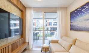 Apartamento básico | Área de estar | Smart TV 32 polegadas com canais digitais