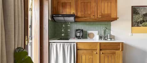 Apartamento, kitchenette, vista para o lago | Cozinha privada
