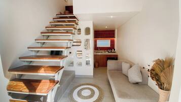 Quarto casal luxo | Área de estar