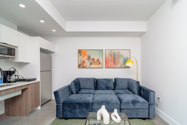 Quarto Individual Deluxe, Vista para a cidade | Sala de estar