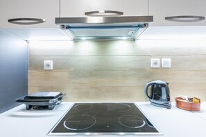 Apartamento Comfort, varanda, Vista para a cidade | Cozinha privada