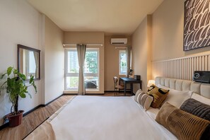 Suíte luxo, vista para a cidade | Roupas de cama premium, edredons de pluma