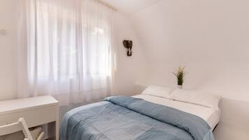 Apartamento | 2 quartos, ferros/tábuas de passar roupa