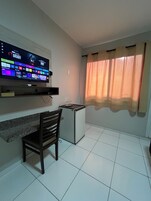 Quarto triplo superior, vista para a cidade | Wi-Fi de cortesia