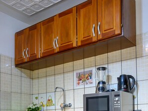 Apartamento, 1 quarto, sacada, vista para o jardim | Parte interna