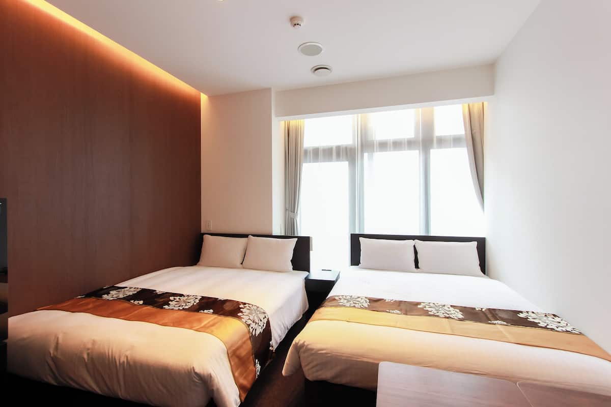 Quarto quádruplo conforto | Wi-Fi de cortesia, roupa de cama
