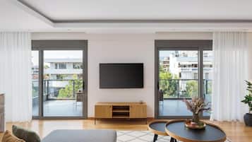 Apartamento Clássico | Sala | Smart TV de 55 polegadas com canais digitais