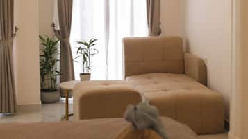 Suíte família | Escrivaninha, Wi-Fi de cortesia, roupa de cama