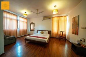 Suite Deluxe | Roupa de cama fornecida