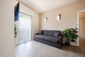 Quarto Superior, varanda | Wi-fi grátis, roupa de cama fornecida