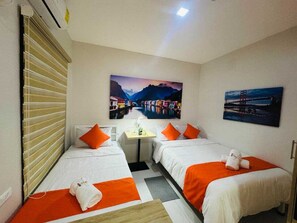 Suite Familiar | Secretária, Wi-fi grátis, roupa de cama fornecida 