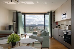 Apartamento Deluxe | Sala de estar
