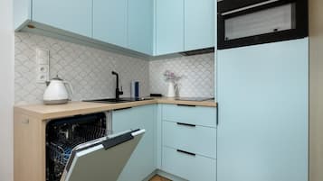 Apartamento | Cozinha privada | Cadeirão de bebê