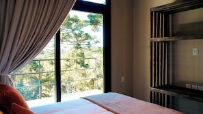 Cabana superior, vista para o pátio | Vista do quarto