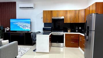 Quarto casal luxo | Cozinha privada