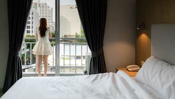 Quarto Triplo de Luxo | Cofre no quarto, cortinas/cortinados opacos, Wi-fi grátis