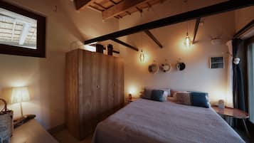 Casa Deluxe, pátio, vista para o jardim | Cortinas/cortinados opacos, ferro/tábua de engomar, Wi-fi grátis