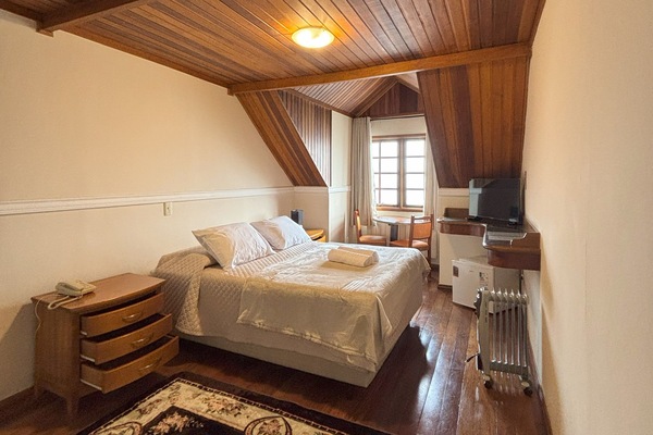 Quarto casal superior | Frigobar, Wi-Fi de cortesia