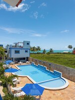 Suite Superior, varanda, vista para o jardim | Sala de estar