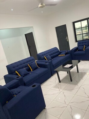 Quarto Quádruplo Deluxe | Sala de estar