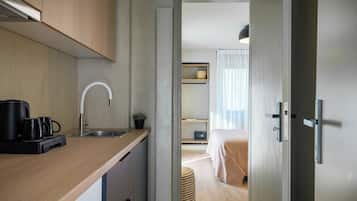 Apartamento Exclusivo, varanda | Cozinha privada | Minifrigorífico, uma chaleira elétrica, uma cadeira de bebé