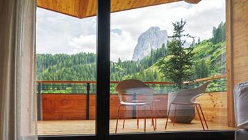 Camera Deluxe con Sauna | Cofres nos quartos, cortinas blackout, Wi-Fi de cortesia