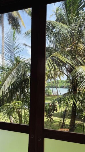 Quarto casal | Vista para o jardim