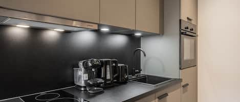 Apartamento | Cozinha privada | Talheres/pratos/utensílios de cozinha