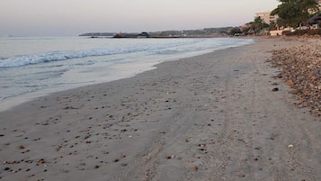 Perto da praia, praia de areia branca, massagens na praia