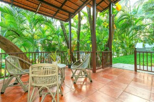 Quarto Duplo Comfort, vista para o jardim | Terraço/pátio interior