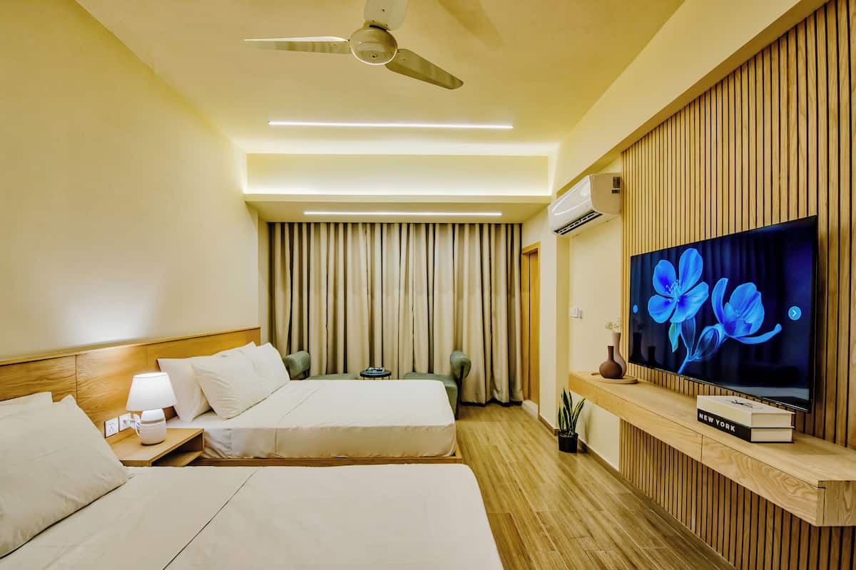 Quarto Duplo Executivo | Minibar, secretária, Wi-fi grátis, roupa de cama fornecida