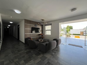 Apartamento, 2 quartos | Lounge executivo