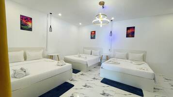 Quarto Triplo Deluxe | Secretária, Wi-fi grátis