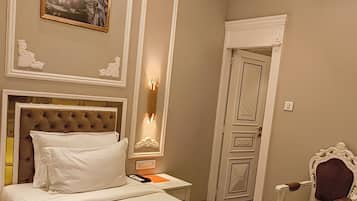 Quarto solteiro standard | Cofres nos quartos, ferros/tábuas de passar roupa, Wi-Fi de cortesia