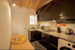 Apartamento Familiar, varanda, Vista para a cidade | Cozinha privada | Uma máquina de café expresso, uma chaleira elétrica, uma torradeira 