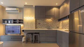 Apartamento, varanda | Cozinha privada