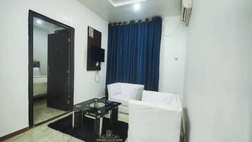 Quarto luxo | Área de estar