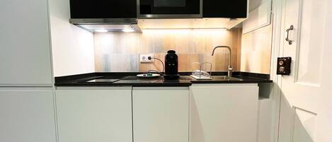 Apartamento (1 Bedroom) | Cozinha privada | Geladeira, micro-ondas, lava-louças, cadeirão de bebê