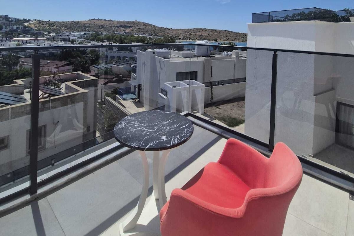 Quarto luxo, vista para o mar | Sacada