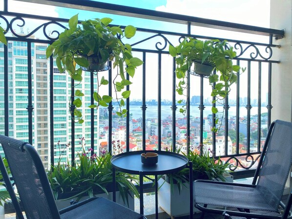Quarto Deluxe, Vista para a cidade | Varanda