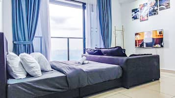 Suite Deluxe, varanda, Vista para a cidade | Ferro/tábua de engomar, Wi-fi grátis