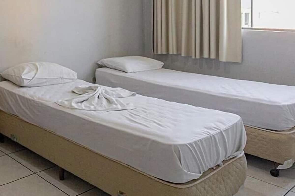 Quarto conforto, ar-condicionado | Wi-Fi de cortesia, roupa de cama