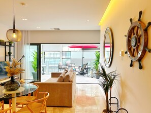 Apartamento conforto, 1 quarto | Área de estar