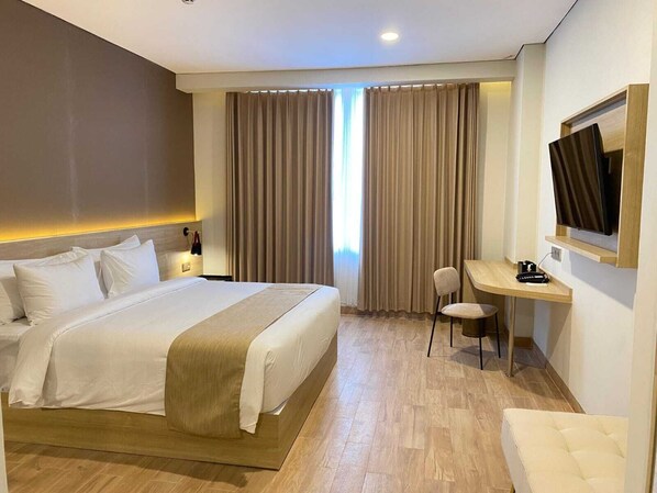 Quarto Individual Deluxe, Vista para a cidade | Secretária, Wi-fi grátis 