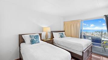 Apartamento standard, varanda coberta, vista para o oceano | Ferros/tábuas de passar roupa, Wi-Fi de cortesia