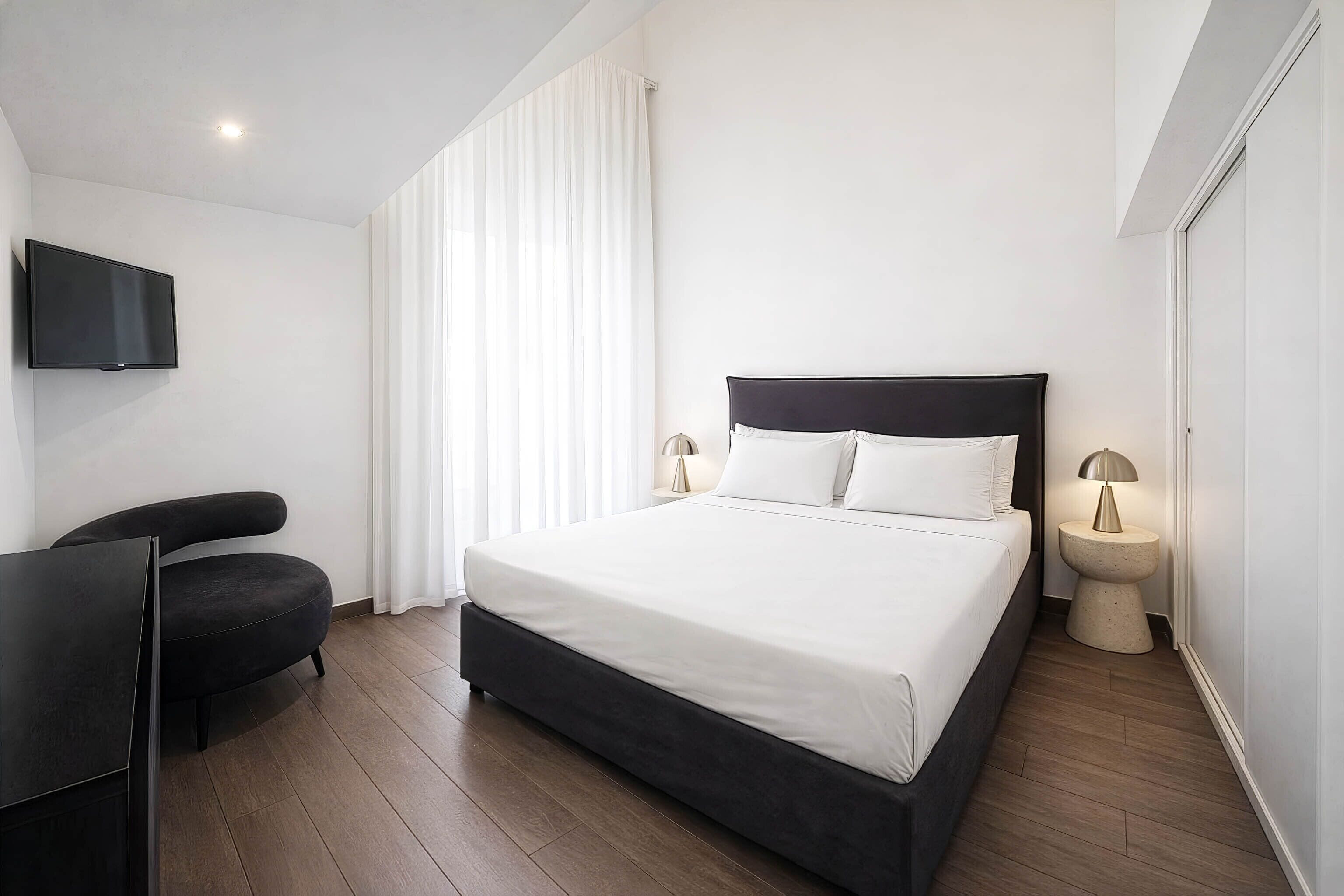 Apartamento, 2 quartos, varanda, Vista para a cidade | Sala de estar | TV de ecrã plano 