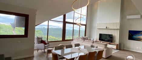 Apartamento Deluxe, pátio, vista para a montanha | Sala de estar