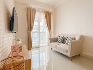 Apartamento standard | Área de estar